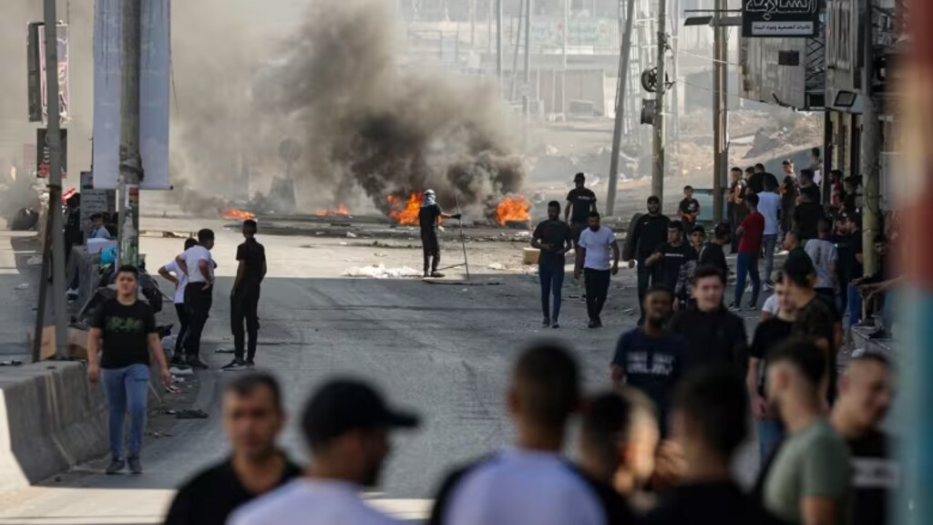 A group of Canadians in the West Bank have crossed into Jordan by bus ...