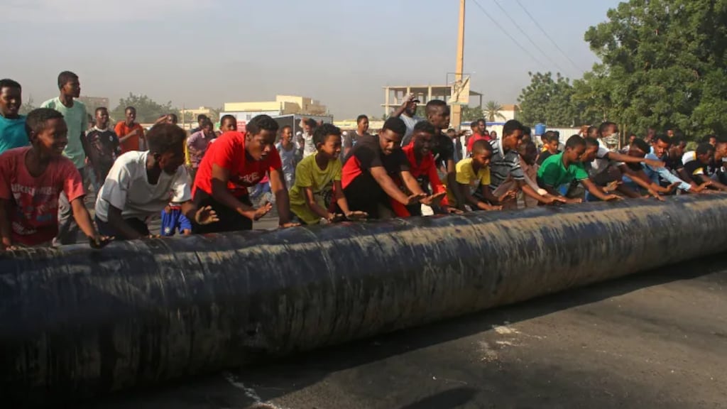 Sudan capital locked down after military takeover triggers deadly ...