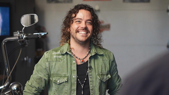 Ricky Paquette, souriant.